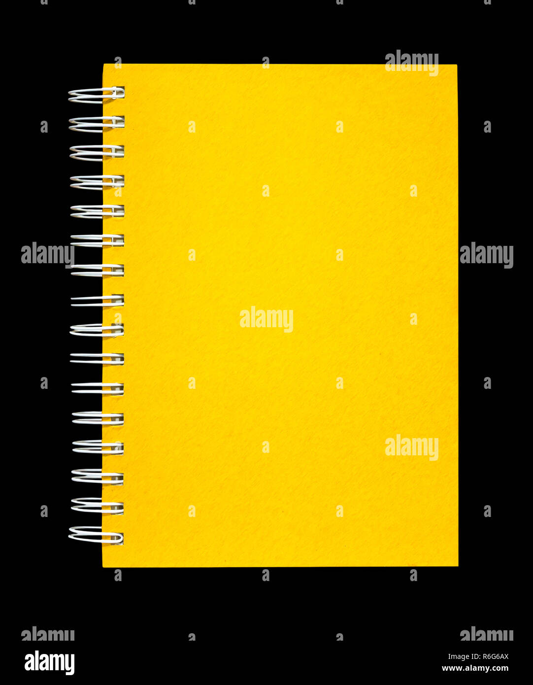 Yellow notebook isolated Stock Photo - Alamy