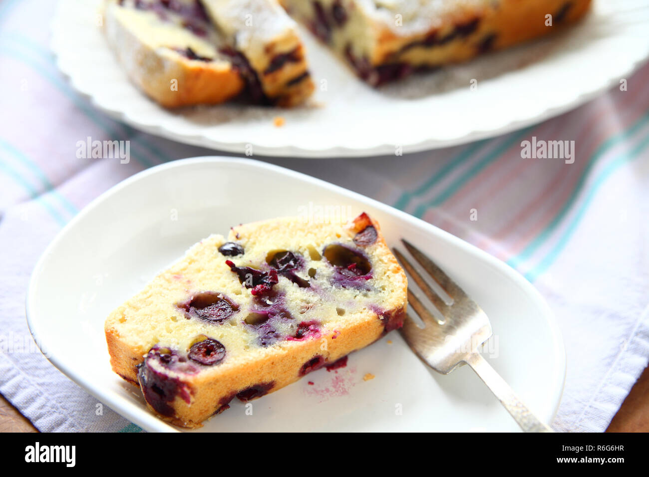 Blueberry loaf cake slice Stock Photo - Alamy