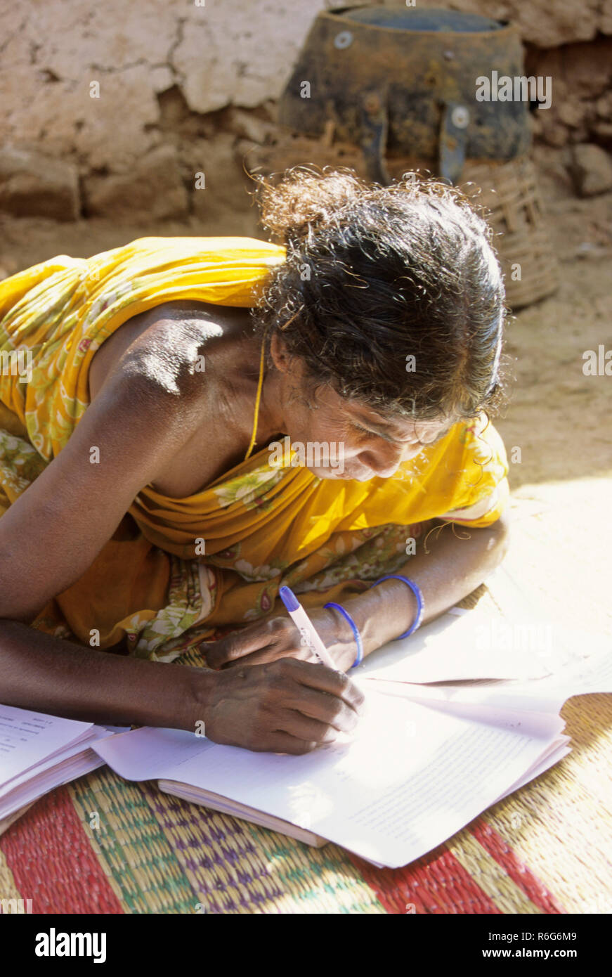 Tribal woman studying hi-res stock photography and images - Alamy