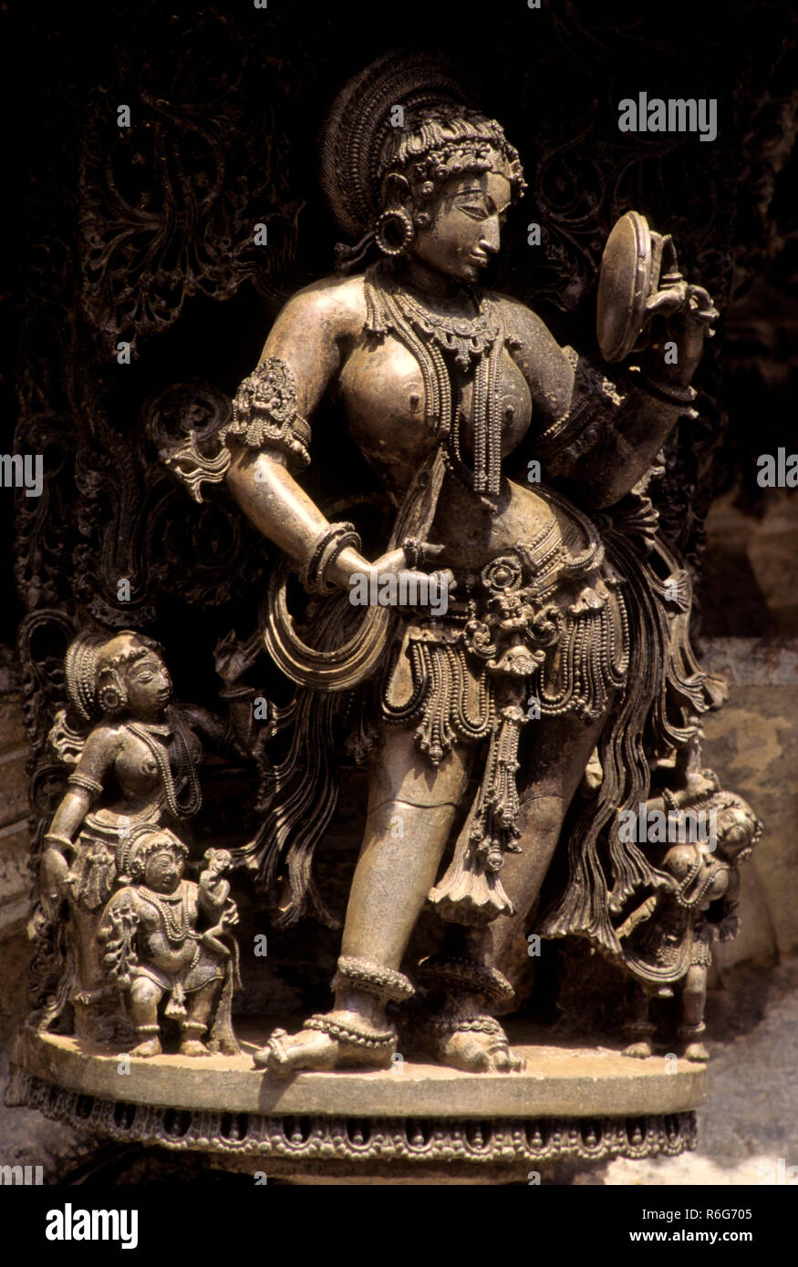 lady with mirror, darpana sundari at sri chennakeshava temple, belur, india Stock Photo - Alamy