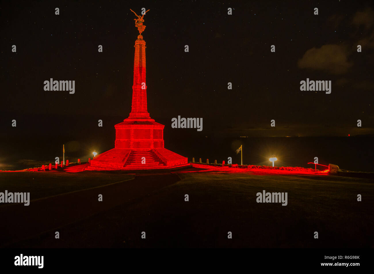 Aberystwyth war memorial lit up in red light in the run up to the 100th ...