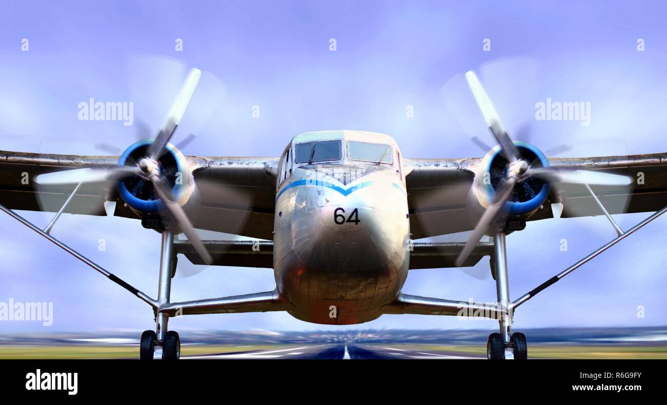 Airplane on runway taking off Stock Photo - Alamy