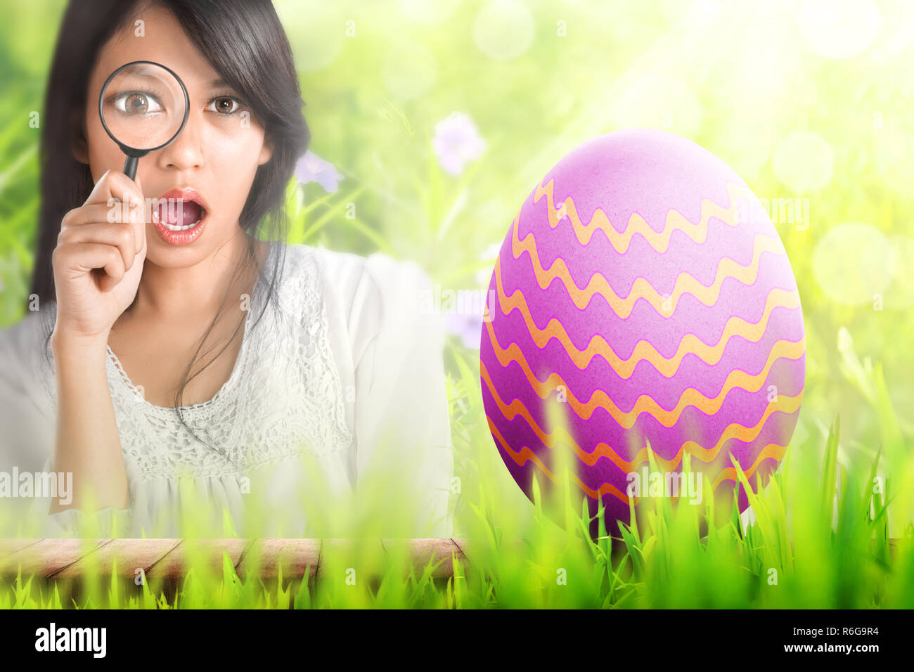 Young asian woman magnifier hi-res stock photography and images - Alamy