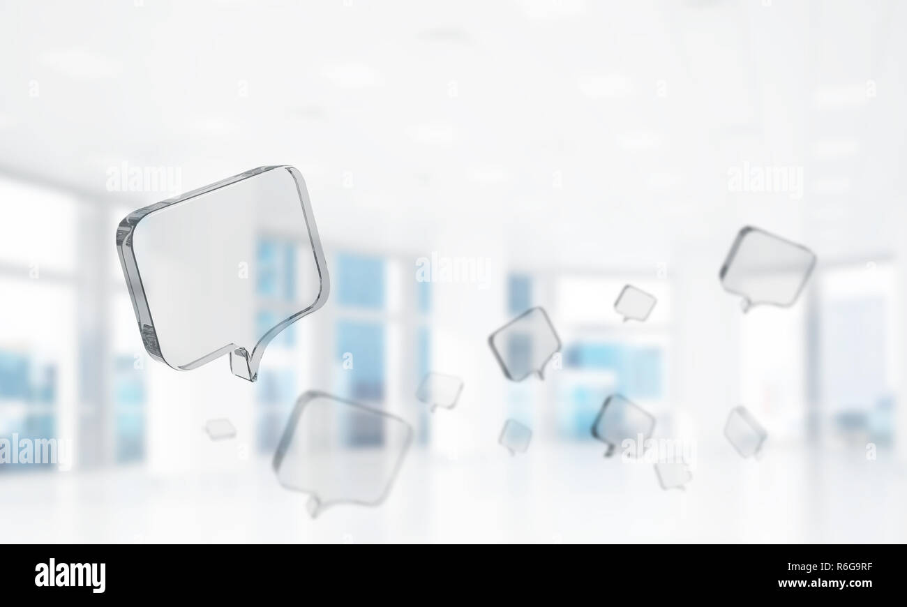 Concept of communication by glass empty chat icon on office background ...