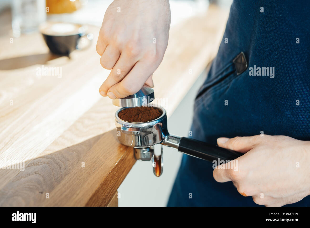 Barista hands holding portafilter hi-res stock photography and images ...