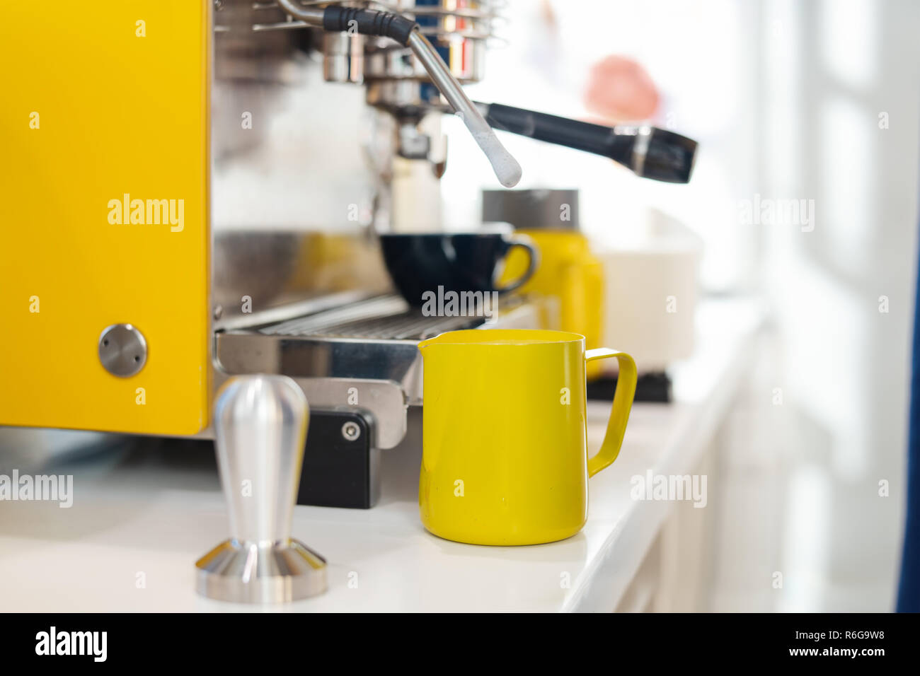Yellow coffee machine hi-res stock photography and images - Alamy