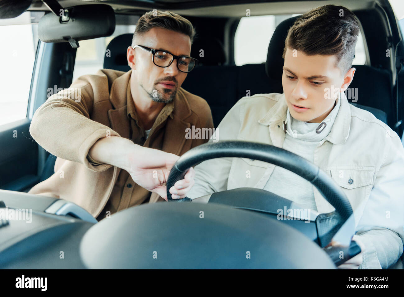 Teaching teen hi-res stock photography and images - Alamy
