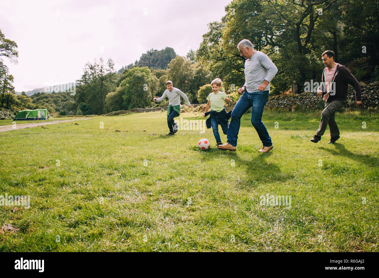 Competitive dad football hi-res stock photography and images - Alamy