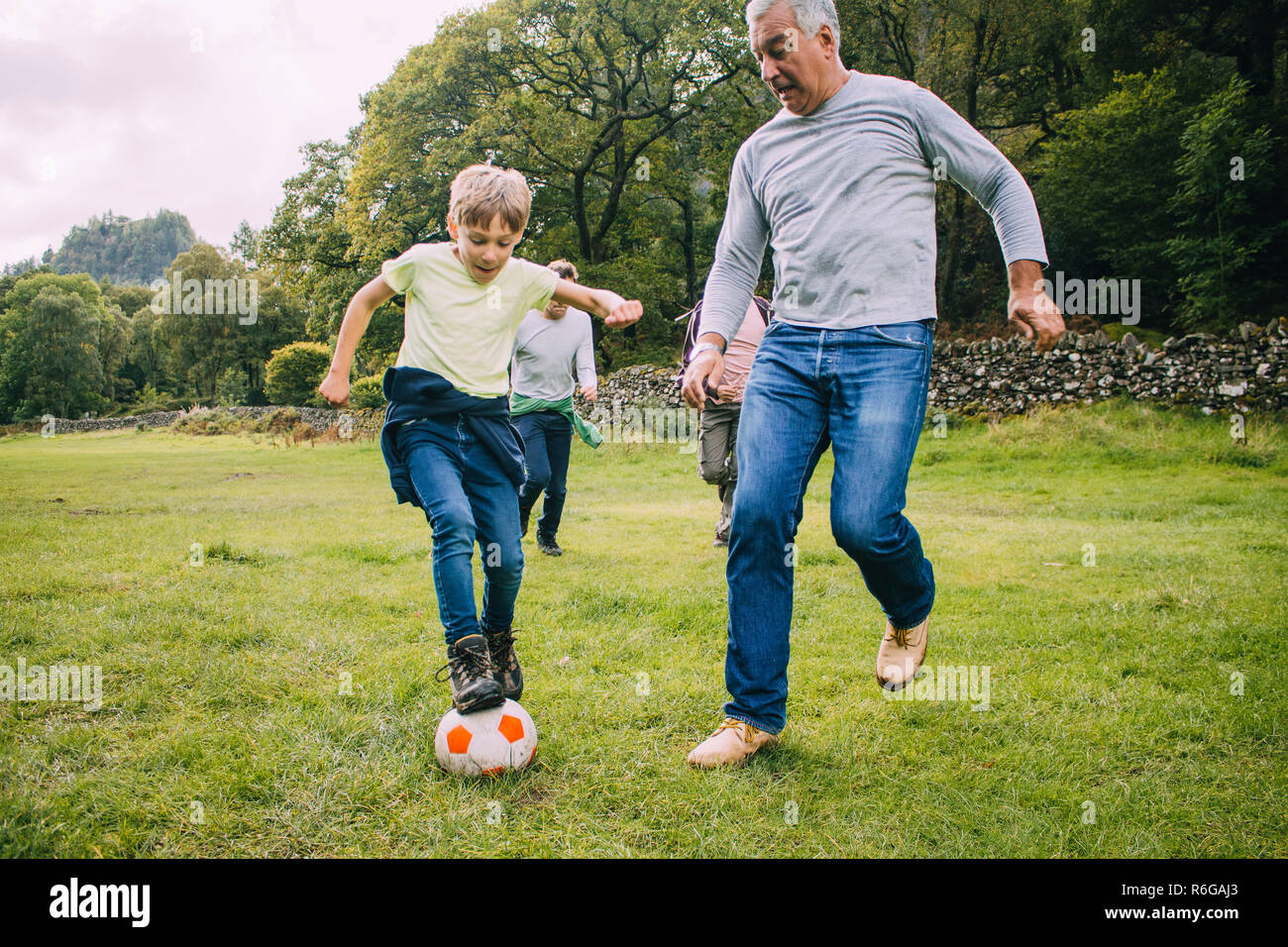 Competitive dad football hi-res stock photography and images - Alamy