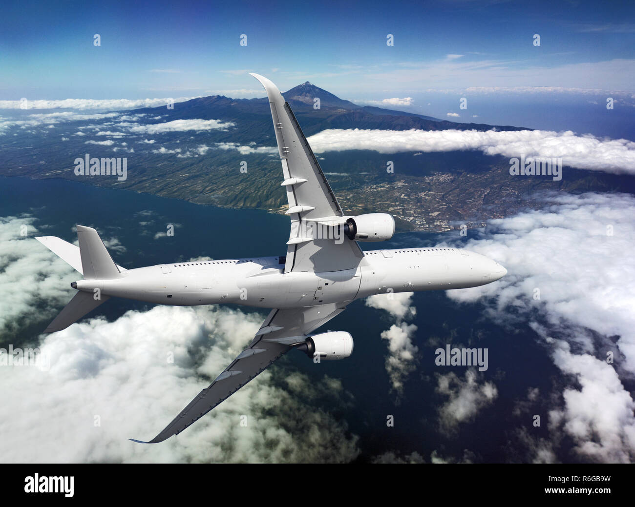 Airbus flying over mountains hi-res stock photography and images - Alamy