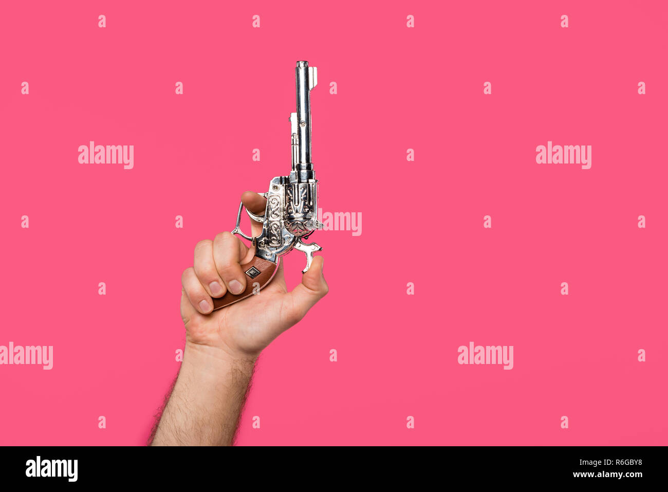 Holding revolver hi-res stock photography and images - Alamy