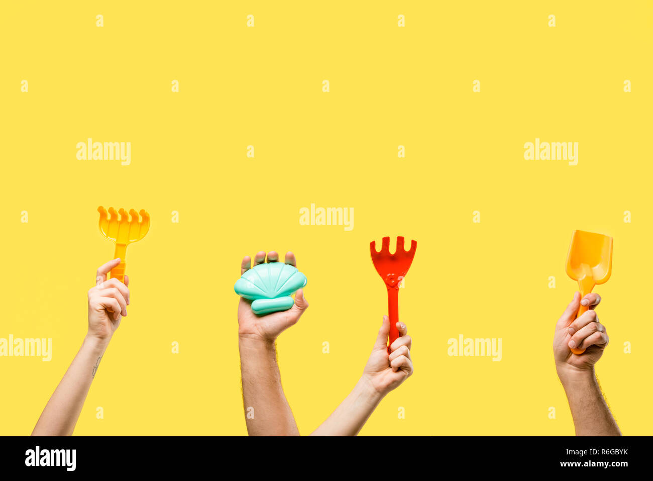 Hands holding toys hi-res stock photography and images - Alamy