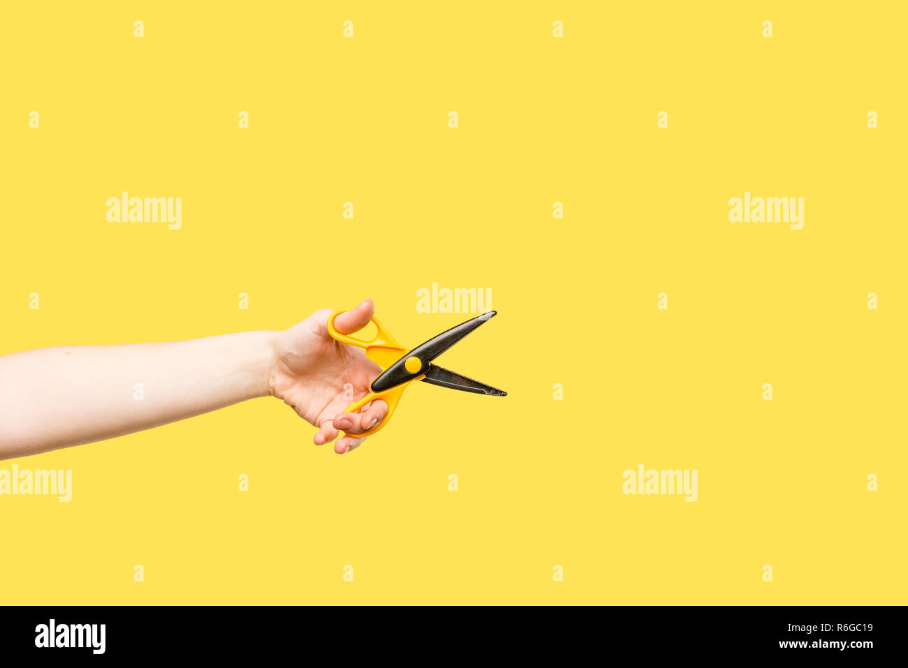 Person holding scissors hi-res stock photography and images - Alamy