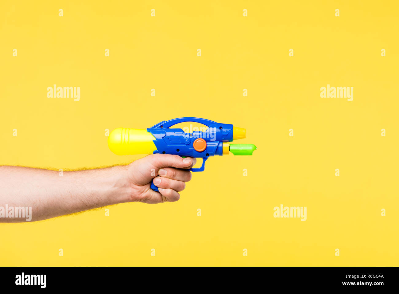 Yellow toy gun hi-res stock photography and images - Alamy