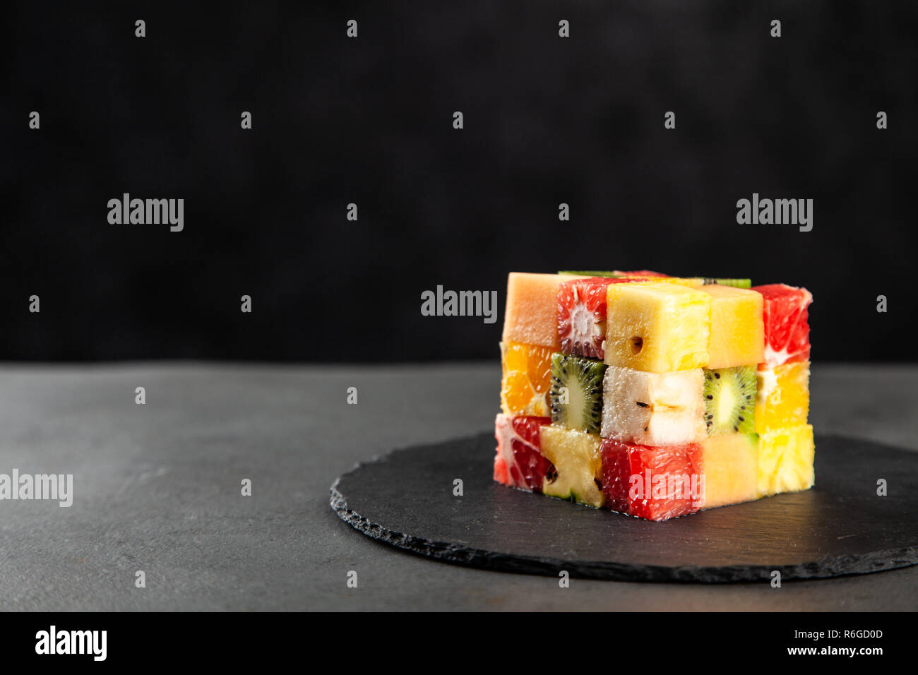 Fruit cube on white background Stock Photo - Alamy