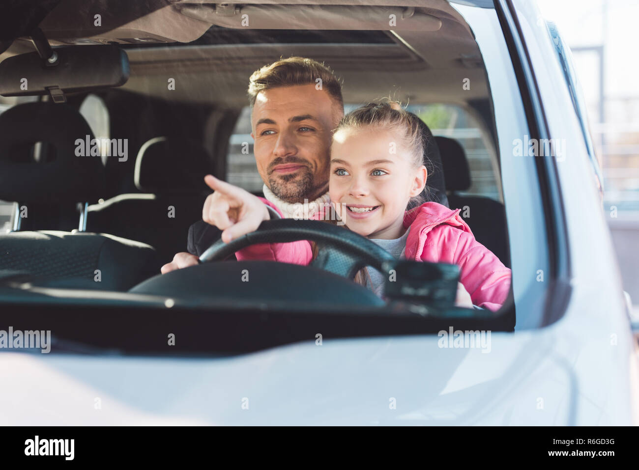 Kid pointing to car hi-res stock photography and images - Alamy