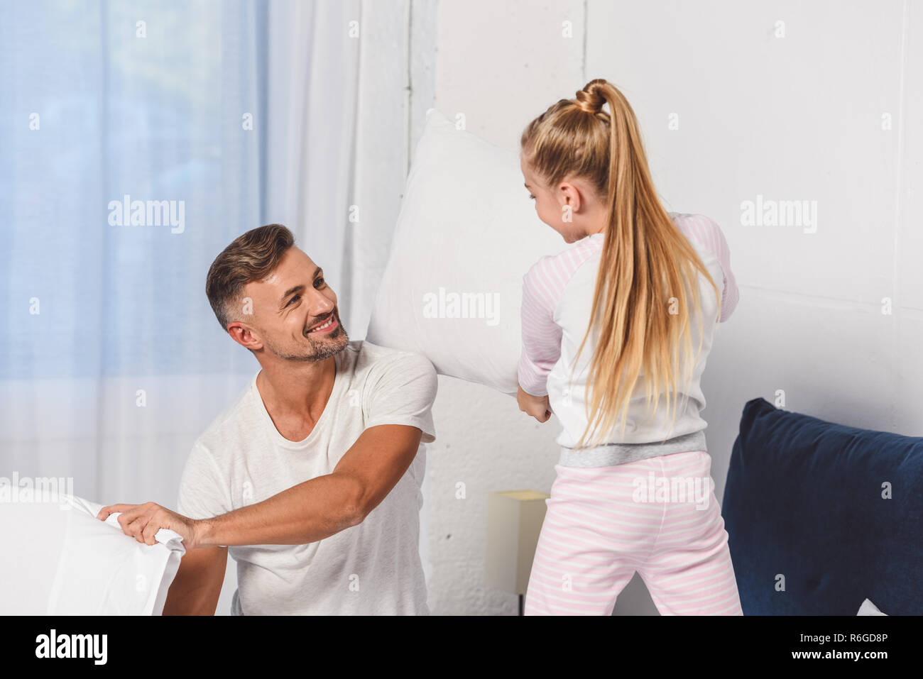 Father daughter having pillow hi-res stock photography and images - Alamy