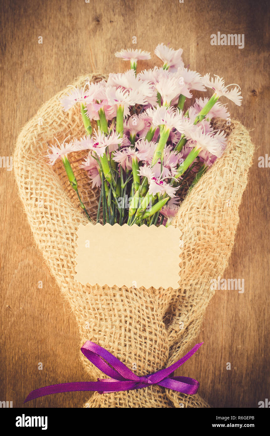 Delicate flowers and empty greeting card Stock Photo - Alamy
