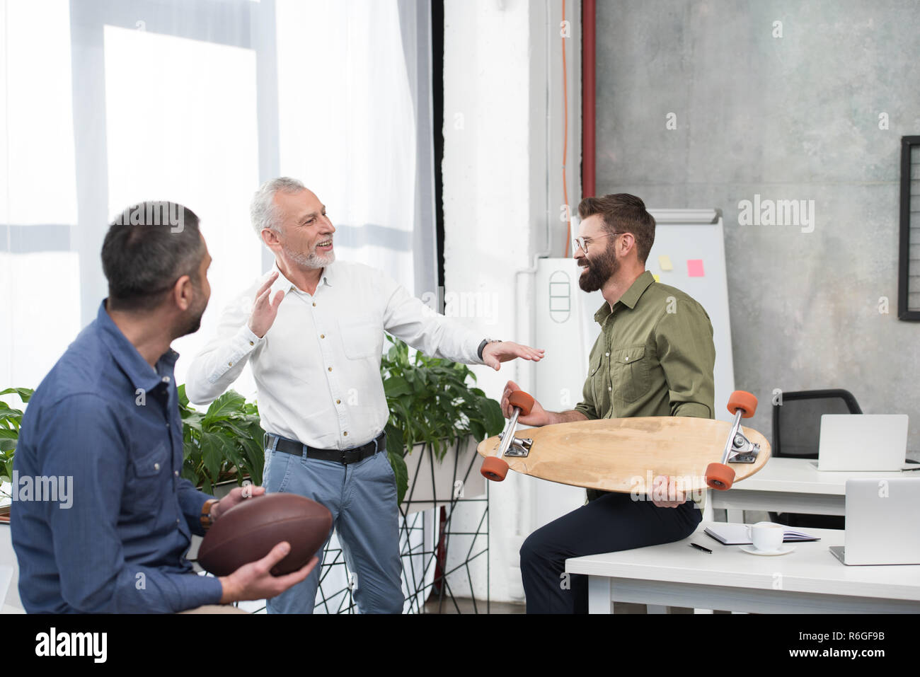 Businessmen having fun in hi-res stock photography and images - Alamy