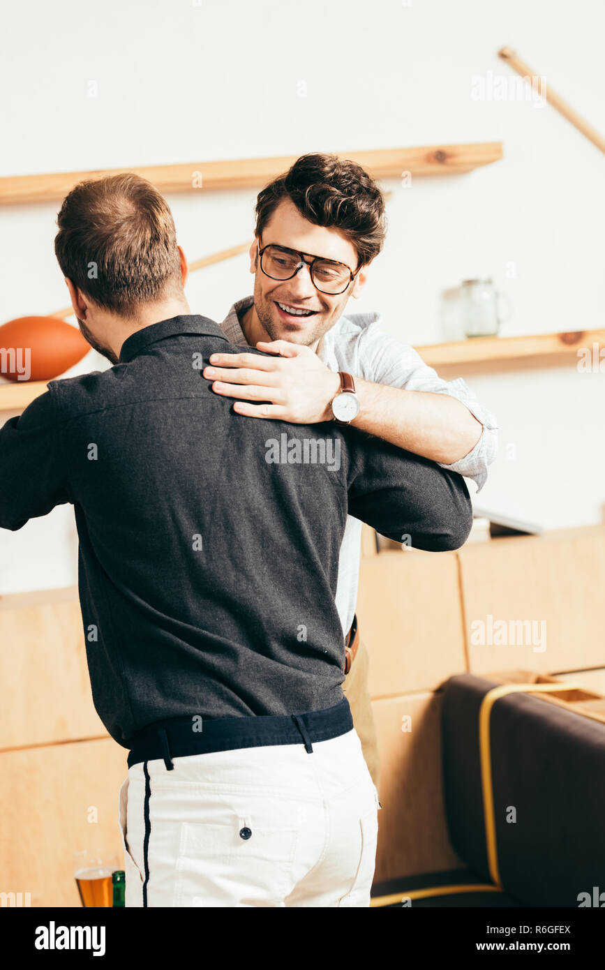 Friends greeting each other hi-res stock photography and images - Alamy