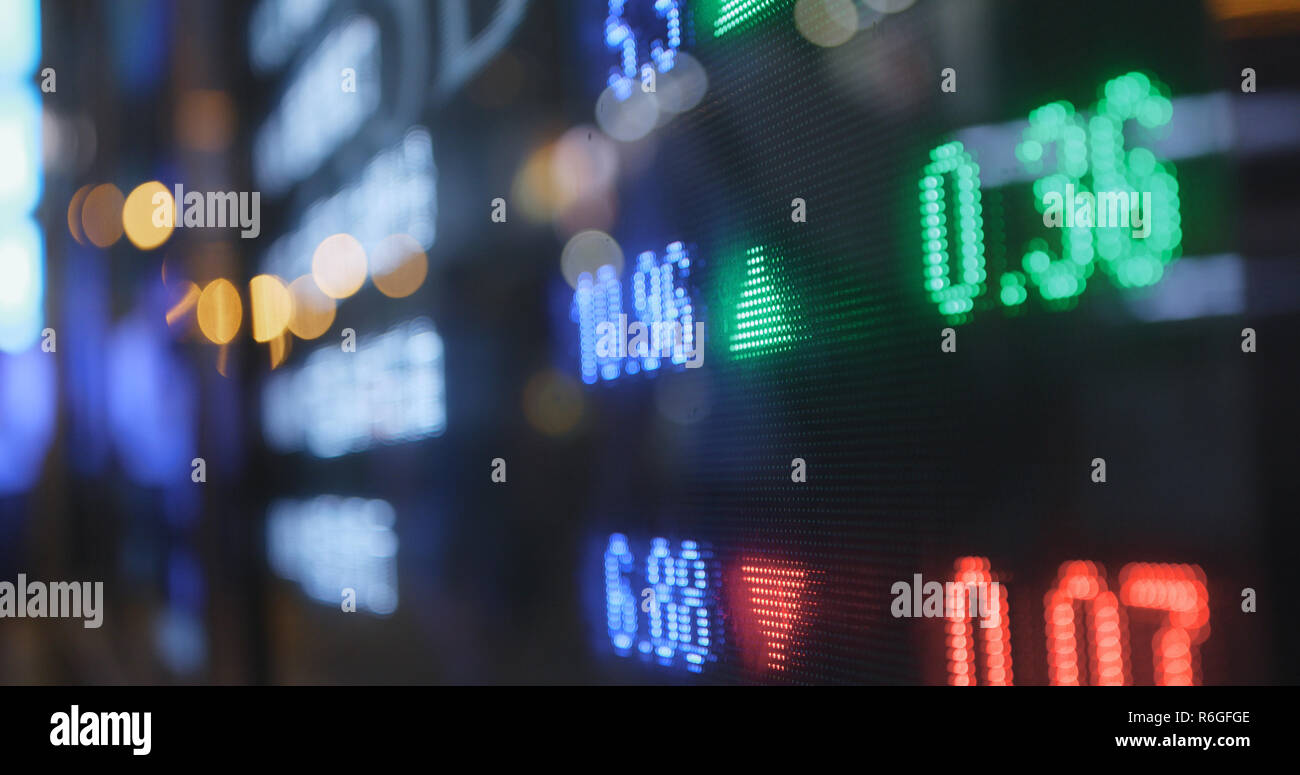 Stock market display at night Stock Photo - Alamy