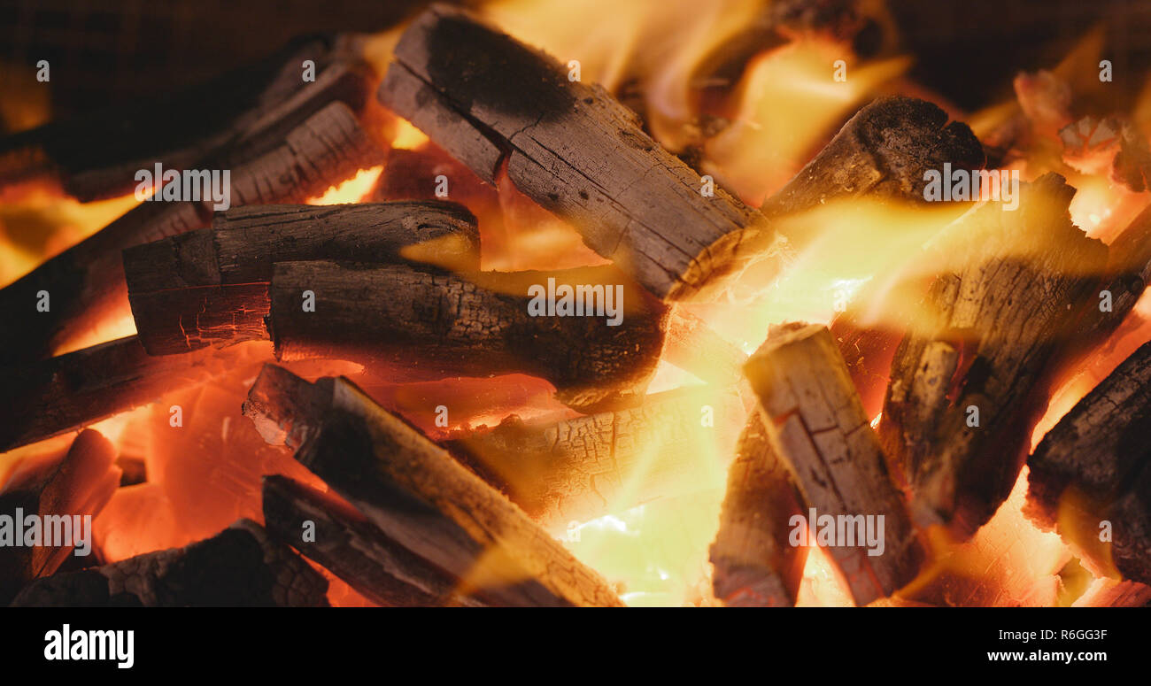 Barbecue Charcoal on fire Stock Photo - Alamy