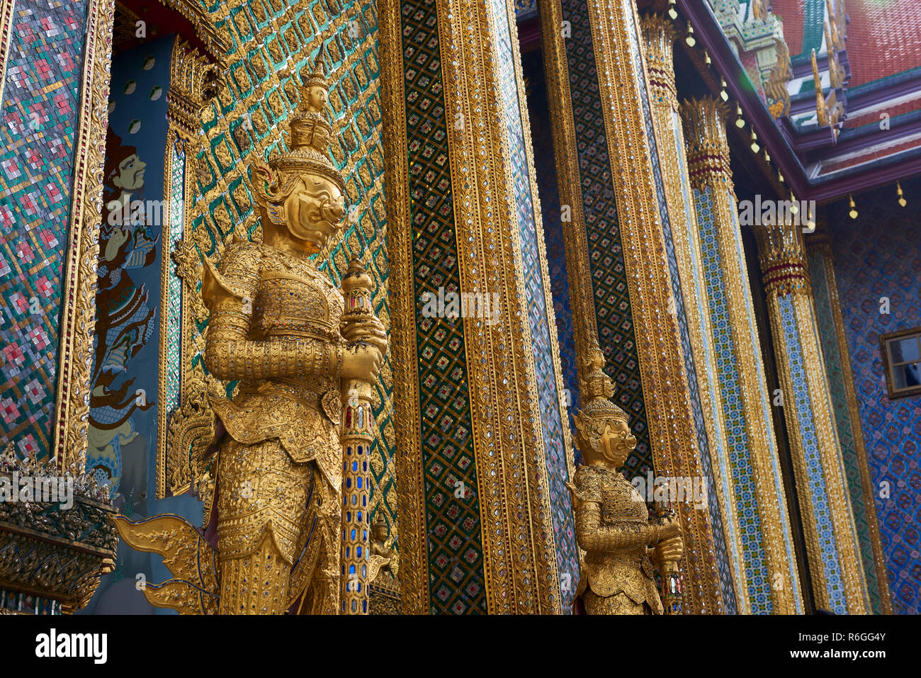Golden Yaksha statue in the Grand Palace in Bangkok, Thailand. The ...