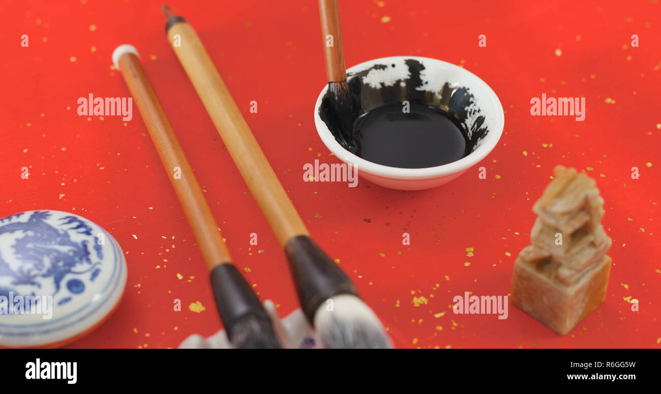 Writing Chinese calligraphy tool on the table Stock Photo - Alamy