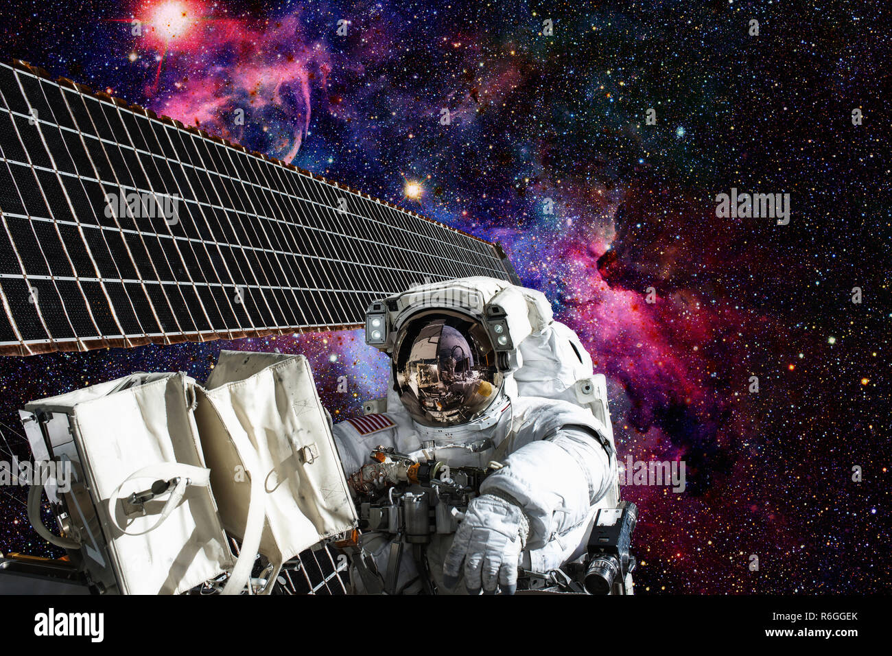 Cosmonaut works outside the International Space Station Stock Photo - Alamy