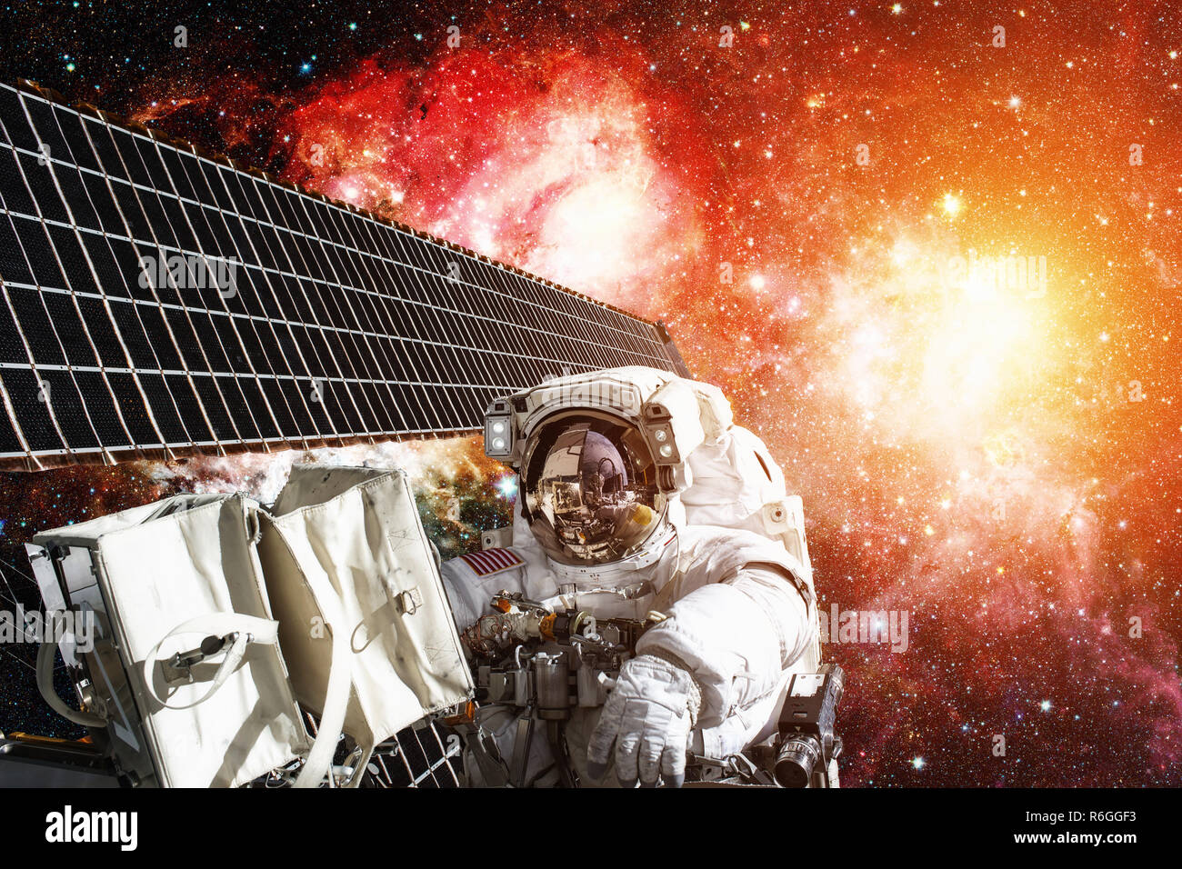 Astronaut on space mission. Elements of this image furnished by NASA ...