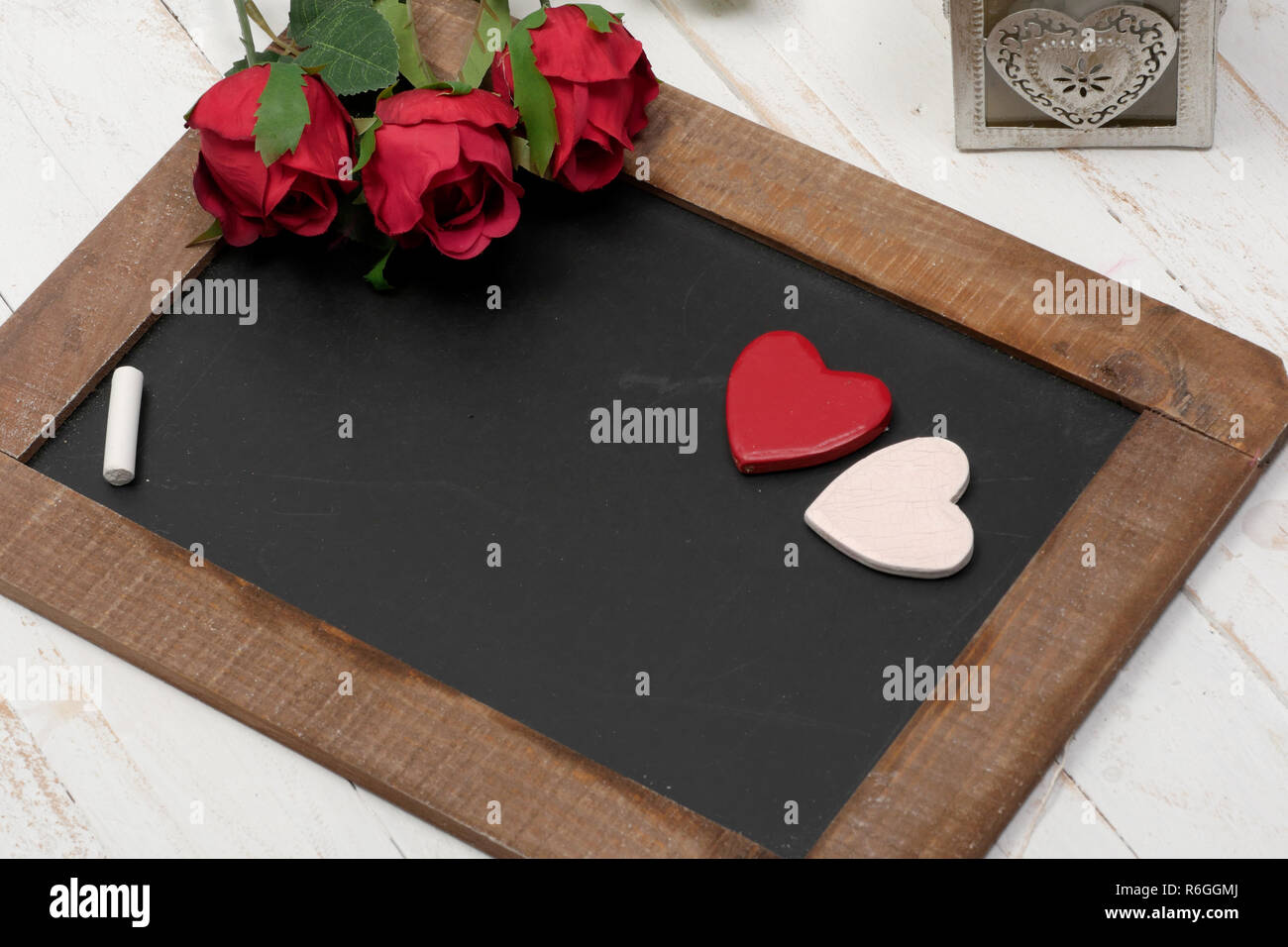concept romantic, small chalkboard, roses and heart Stock Photo - Alamy