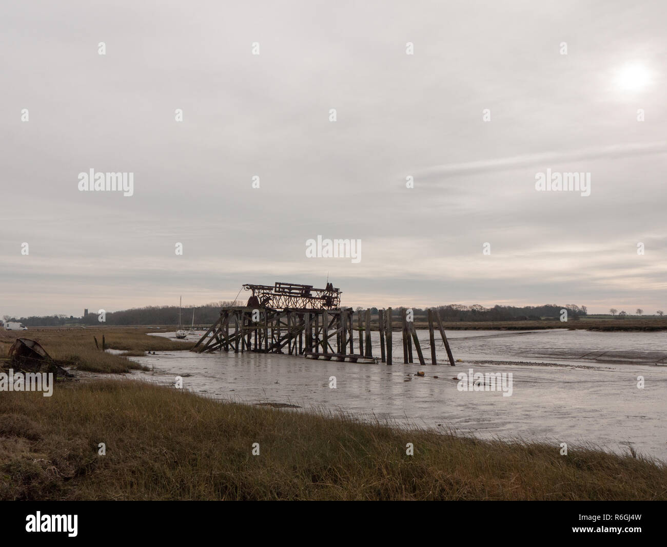 wooden sea structure moody overcast grey sky river estuary Stock Photo ...