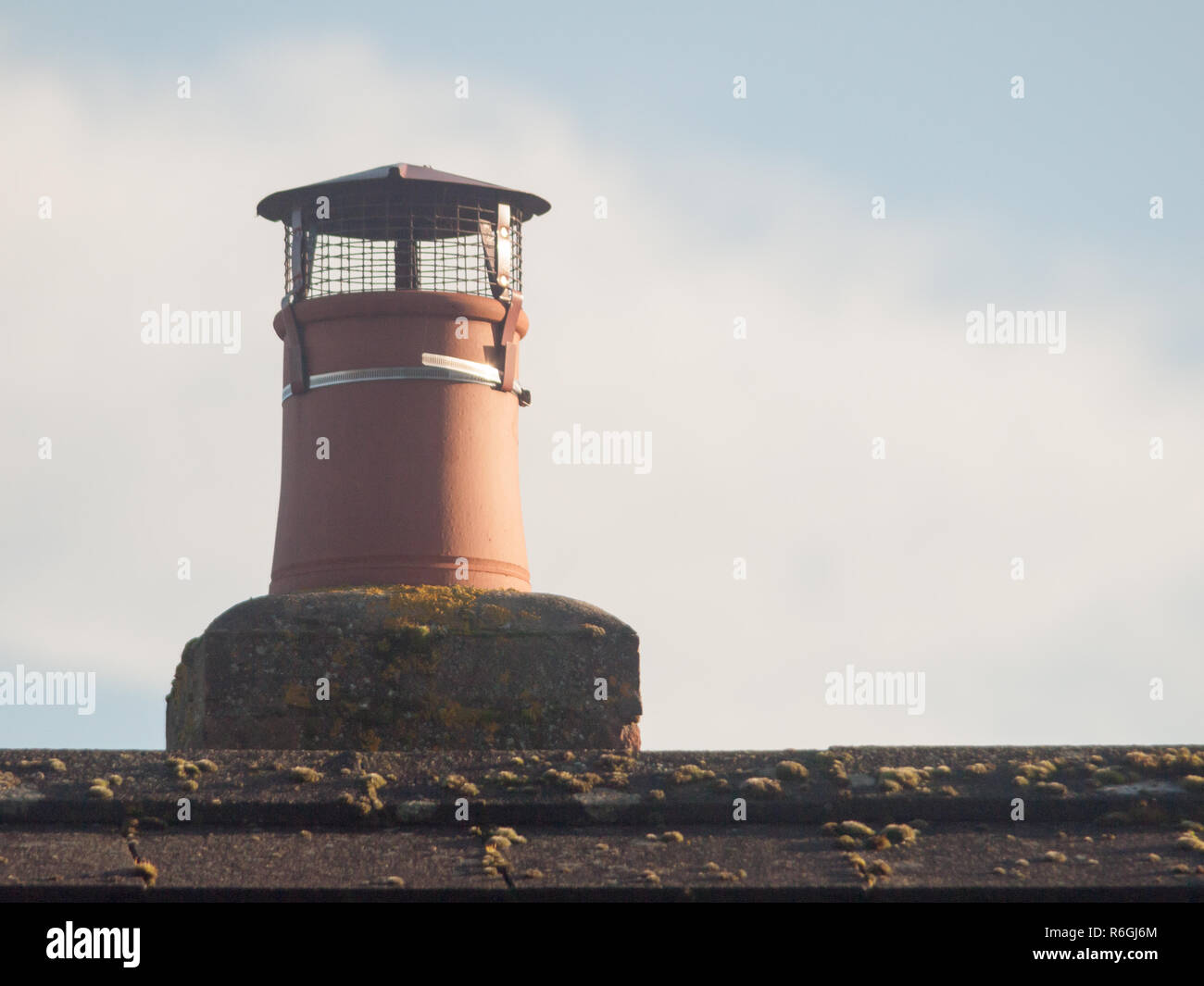 ceramic fume chimney steam modern house roof top Stock Photo - Alamy