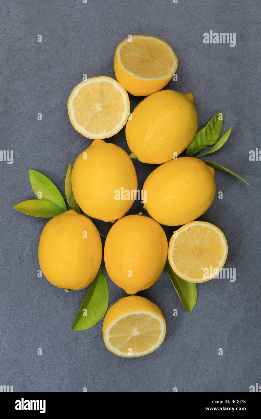 lemon lemon fruits upright slate from above Stock Photo - Alamy