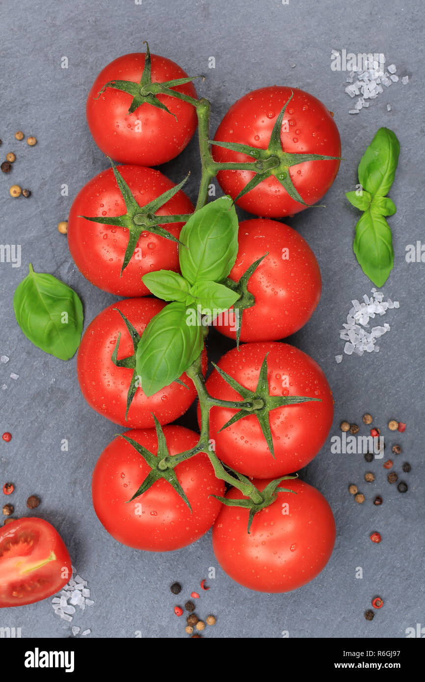 tomato tomato red vegetable upright slate from above Stock Photo - Alamy