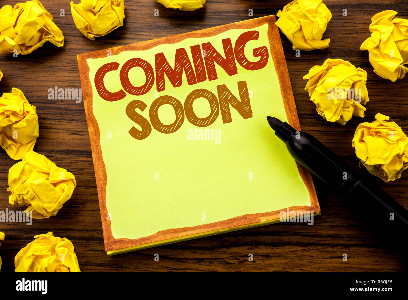 Hand writing text caption showing Coming Soon. Business concept for ...