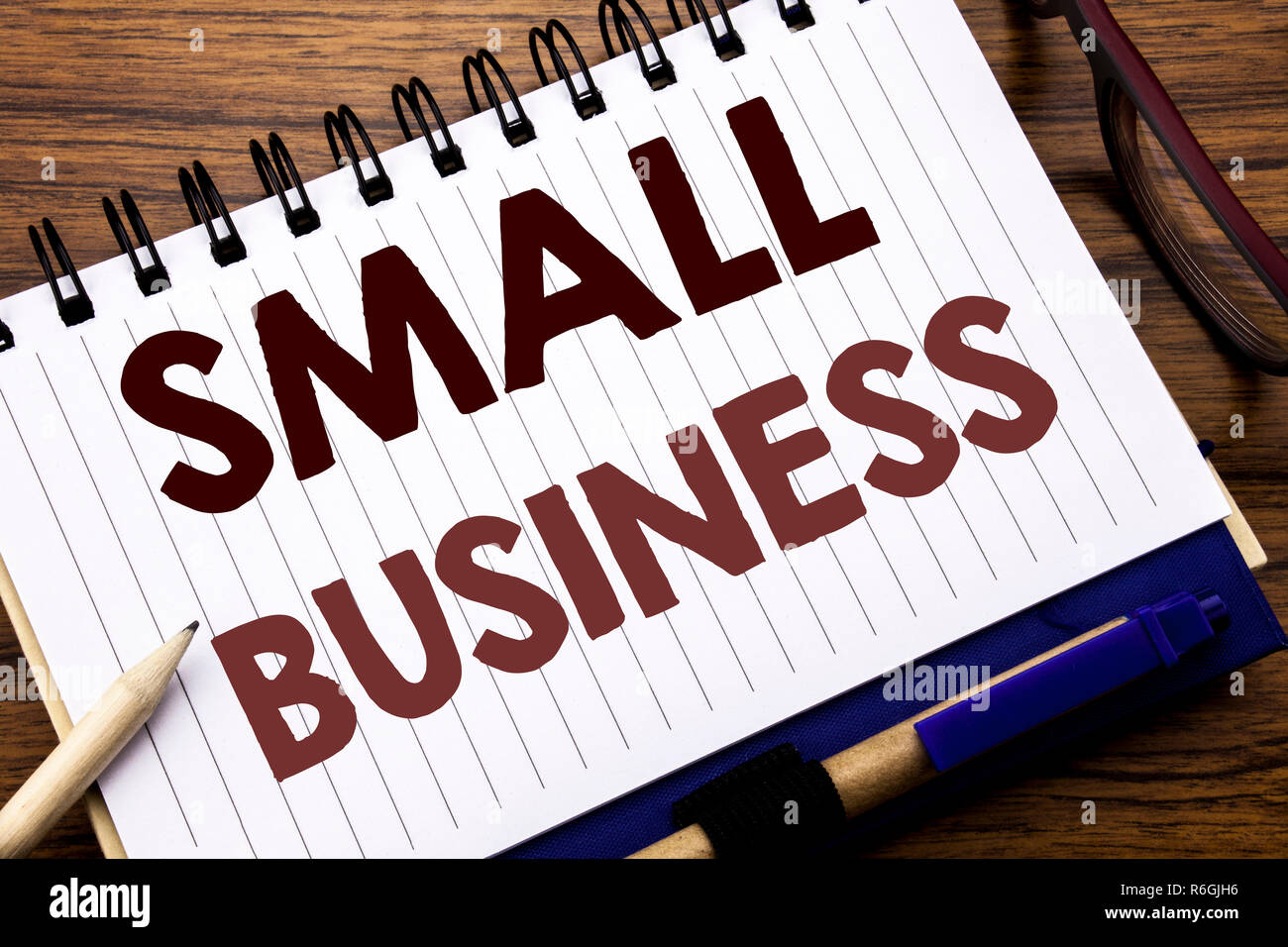 Hand writing text caption inspiration showing Small Business. Business ...