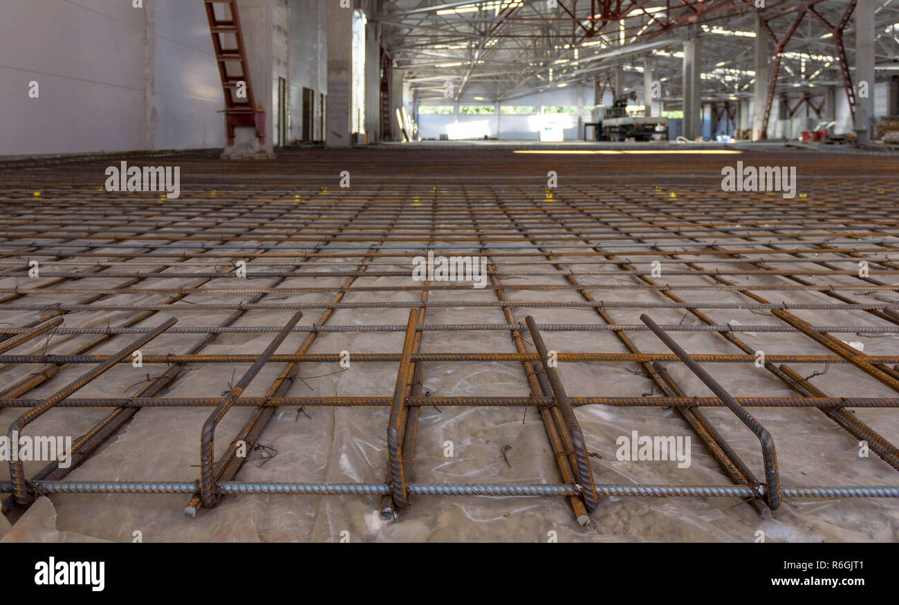 reinforcement frame of the floor prepared for pouring concrete in an ...