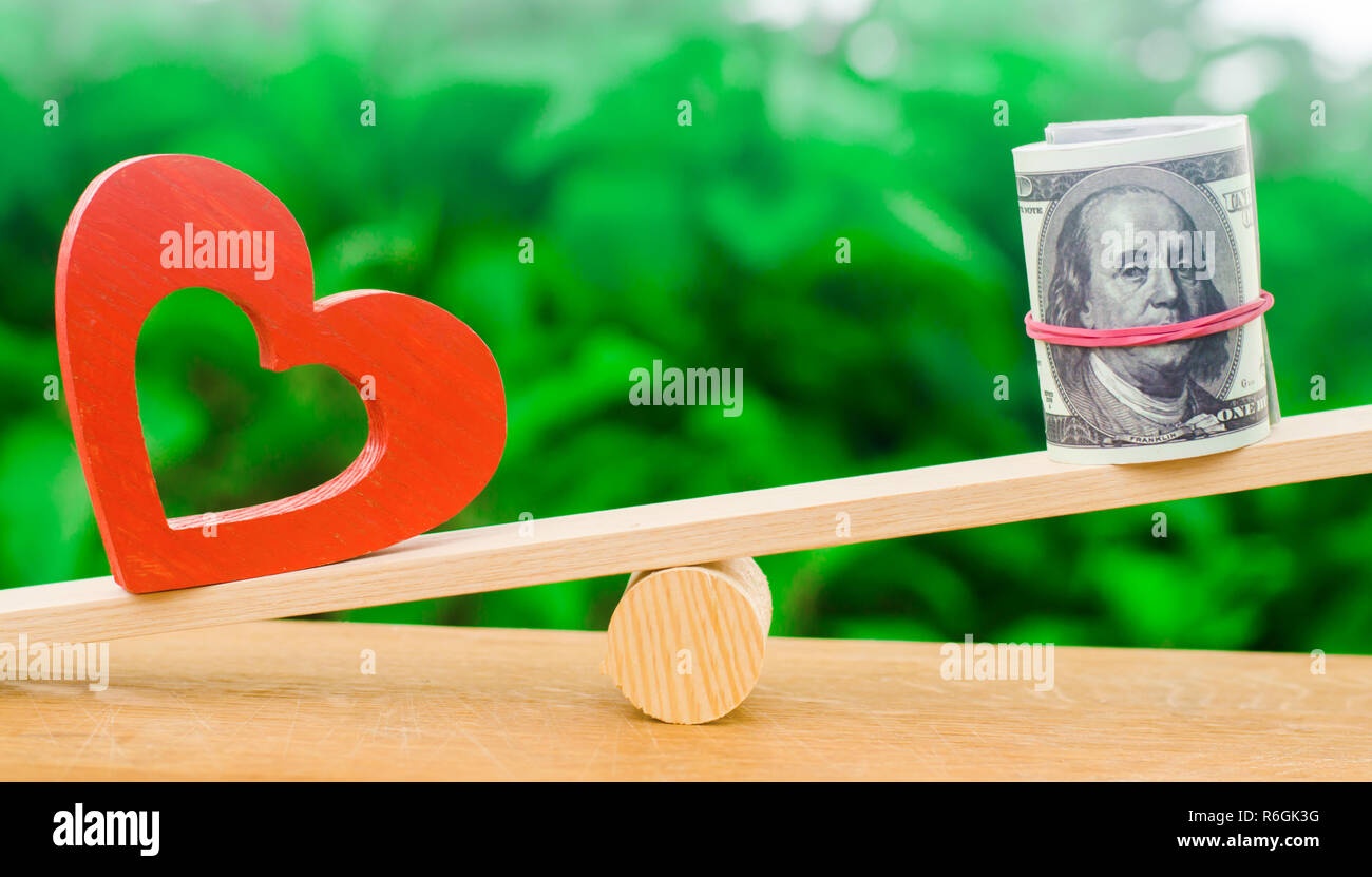 Money versus love concept. Passion versus profit. Family or career ...