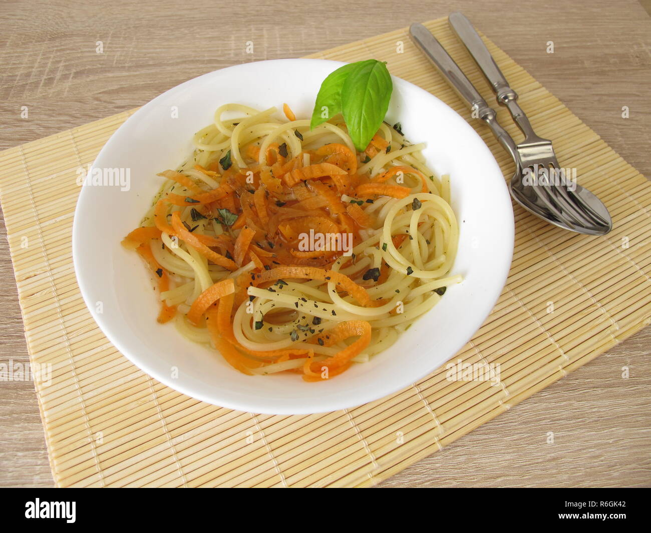 low carb vegetable spaghetti and spaghetti in broth Stock Photo - Alamy