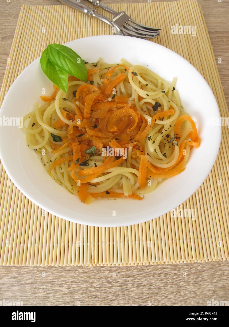 low carb vegetable spaghetti and spaghetti in broth Stock Photo - Alamy