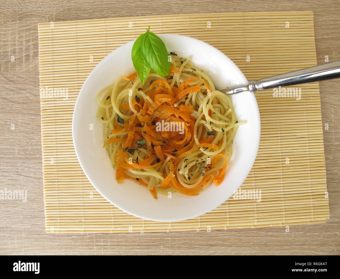 low carb vegetable spaghetti and spaghetti in broth Stock Photo - Alamy