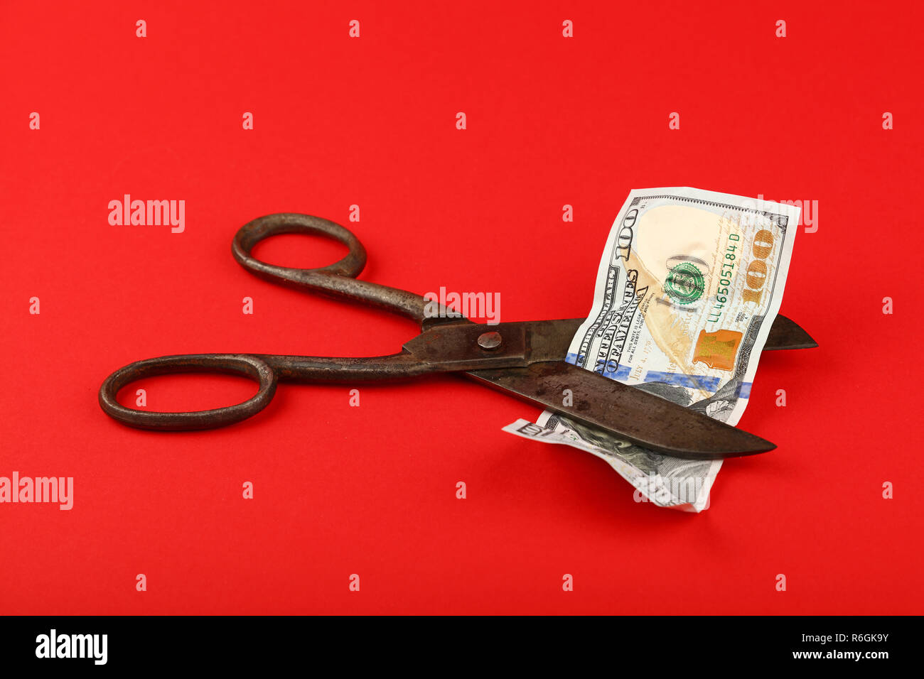 Us money scissors hi-res stock photography and images - Alamy
