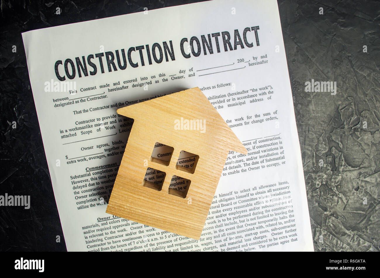 construction contract and house. concept of real estate and planning of ...