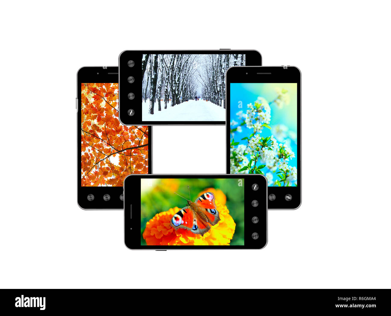 Modern mobile phones with images of four seasons Stock Photo - Alamy