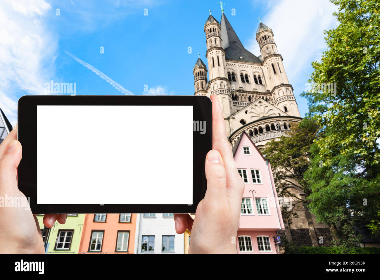 tourist photographs medieval houses in Cologne Stock Photo - Alamy