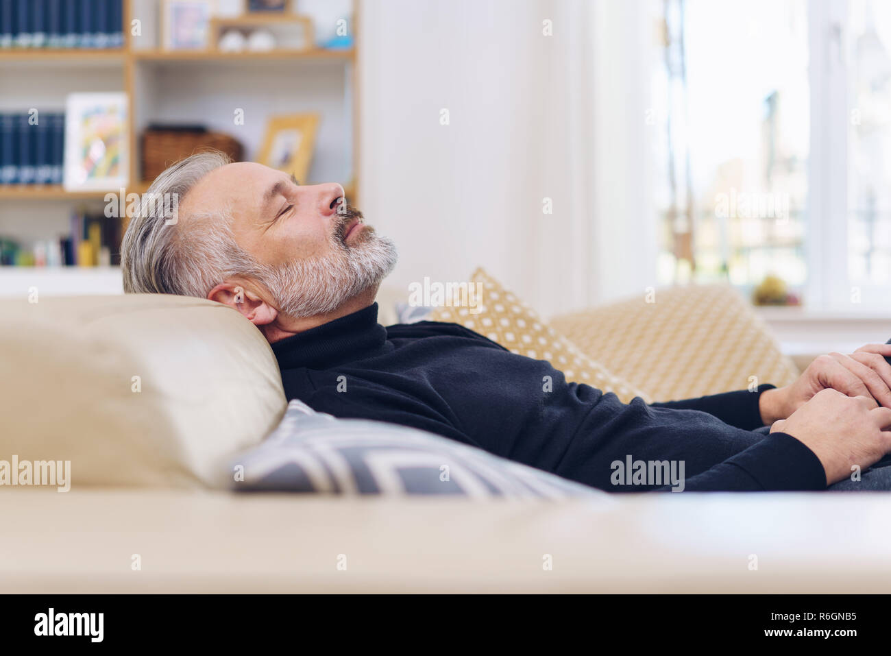 Man nap sofa hi-res stock photography and images - Alamy