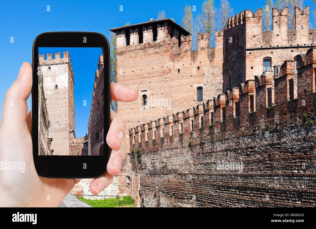 tourist photographs Castelvecchio in Verona Stock Photo - Alamy