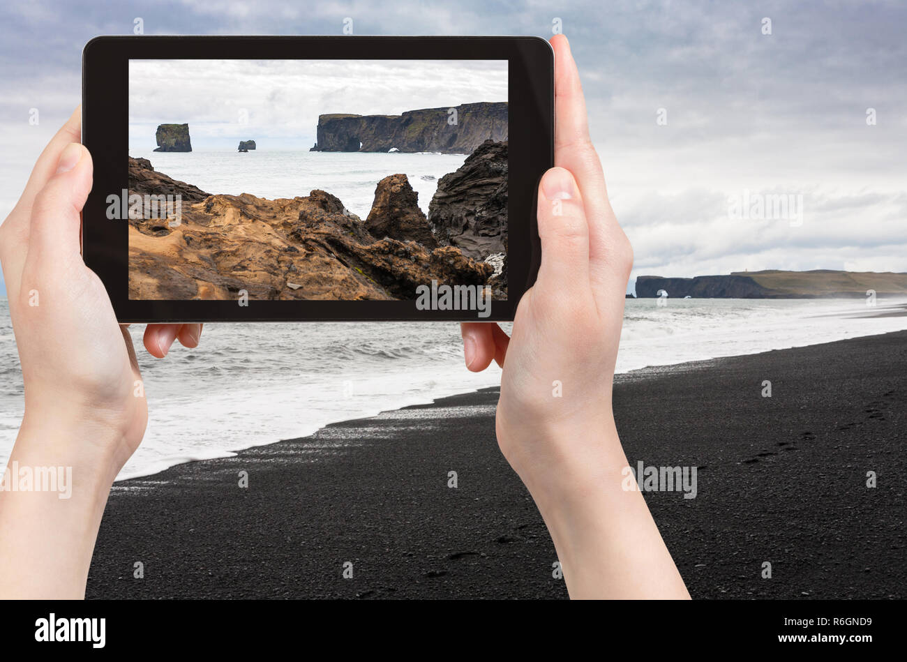 tourist photographs Atlantic ocean volcanic coast Stock Photo - Alamy