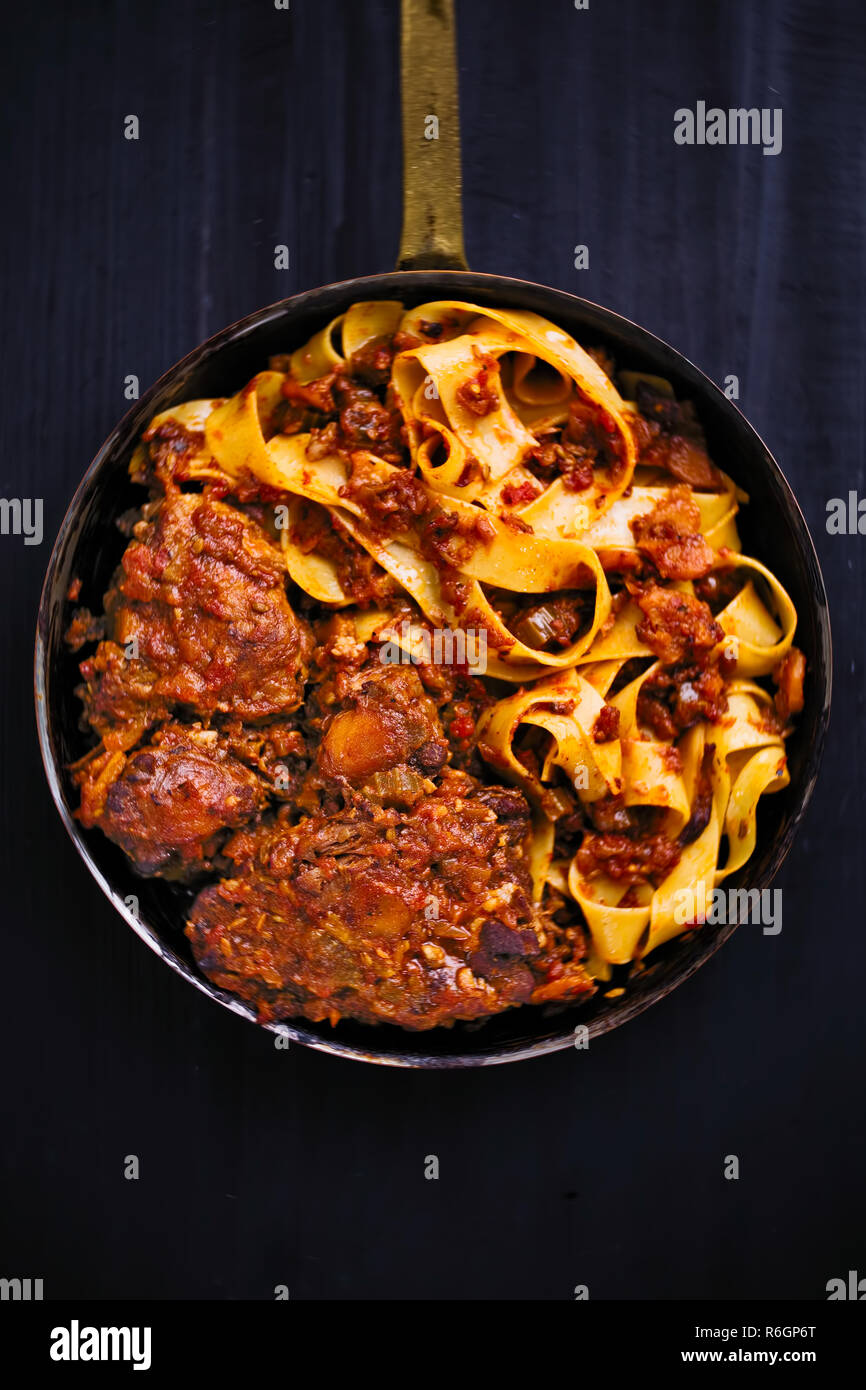 rustic italian oxtail ragu pappardelle pasta Stock Photo - Alamy